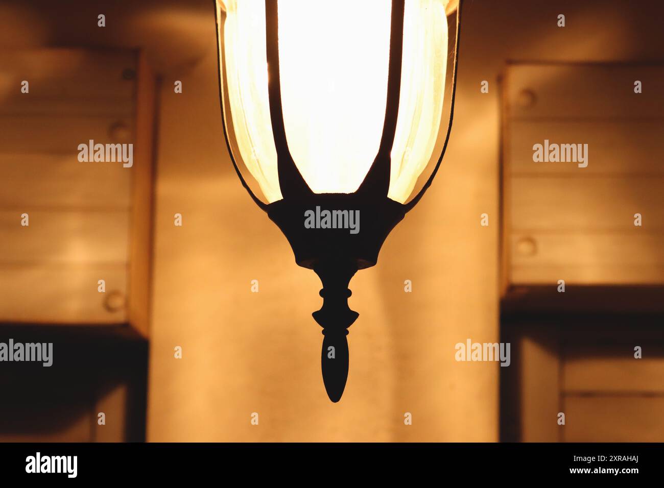 Light in the Dark: Close-Up Look of an Old Lantern with Golden Glow ...