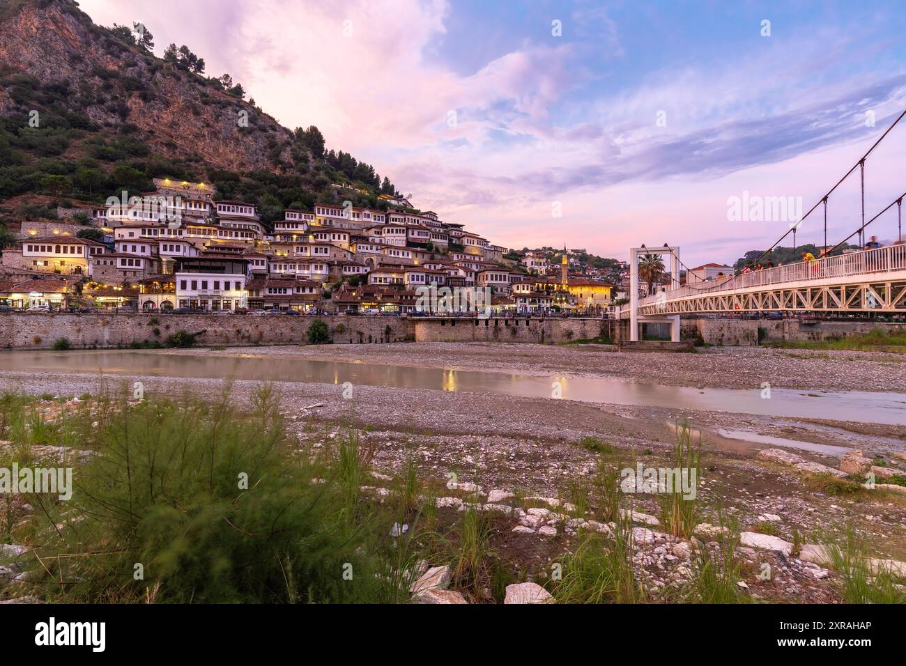Sunset over the UNESCO town of Berat on the Osum River in Albania and ...