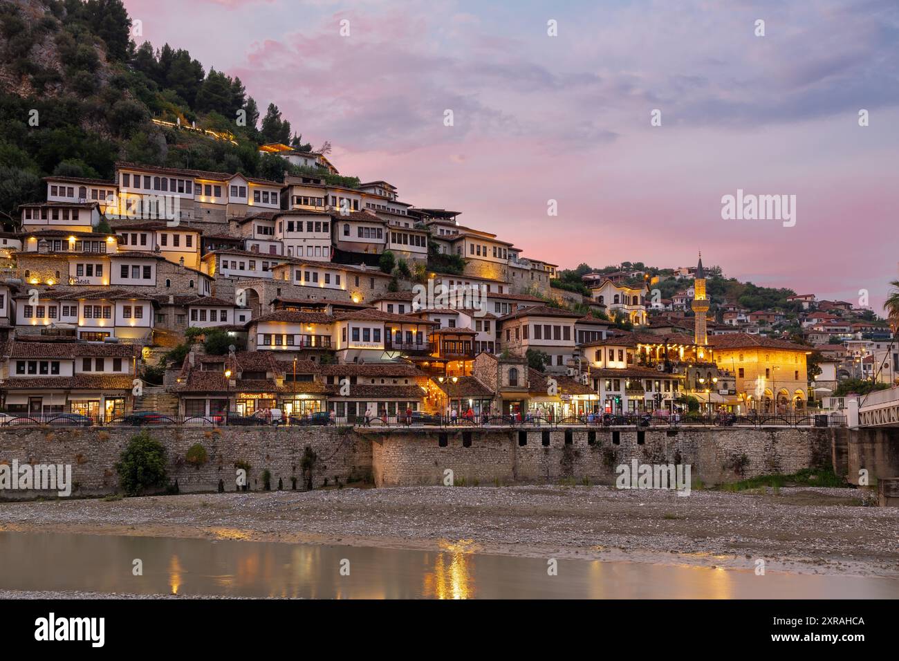 Sunset over the UNESCO town of Berat on the Osum River in Albania and ...