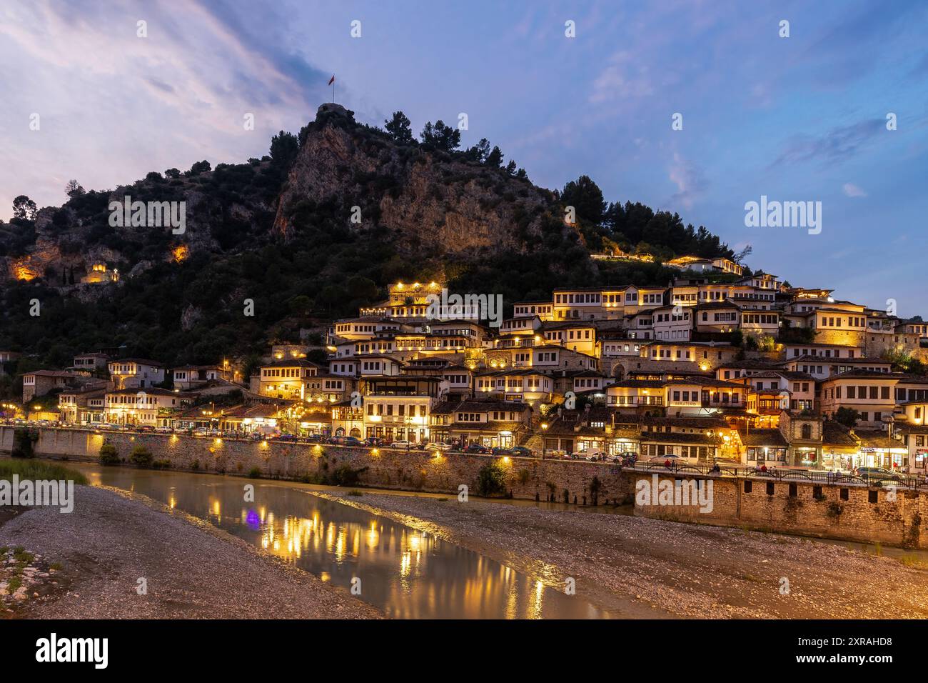 Sunset over the UNESCO town of Berat on the Osum River in Albania and ...
