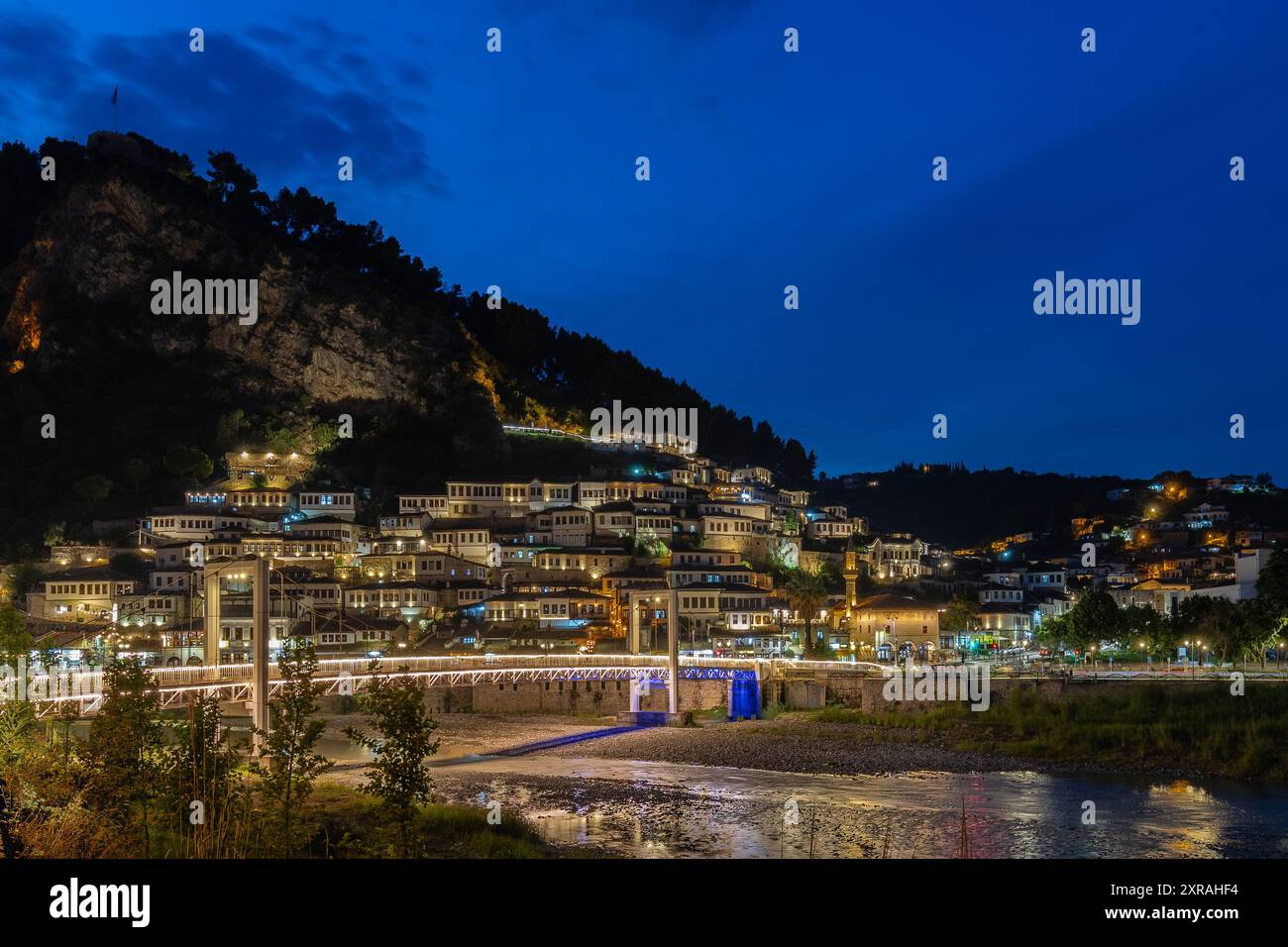 Sunset over the UNESCO town of Berat on the Osum River in Albania and ...