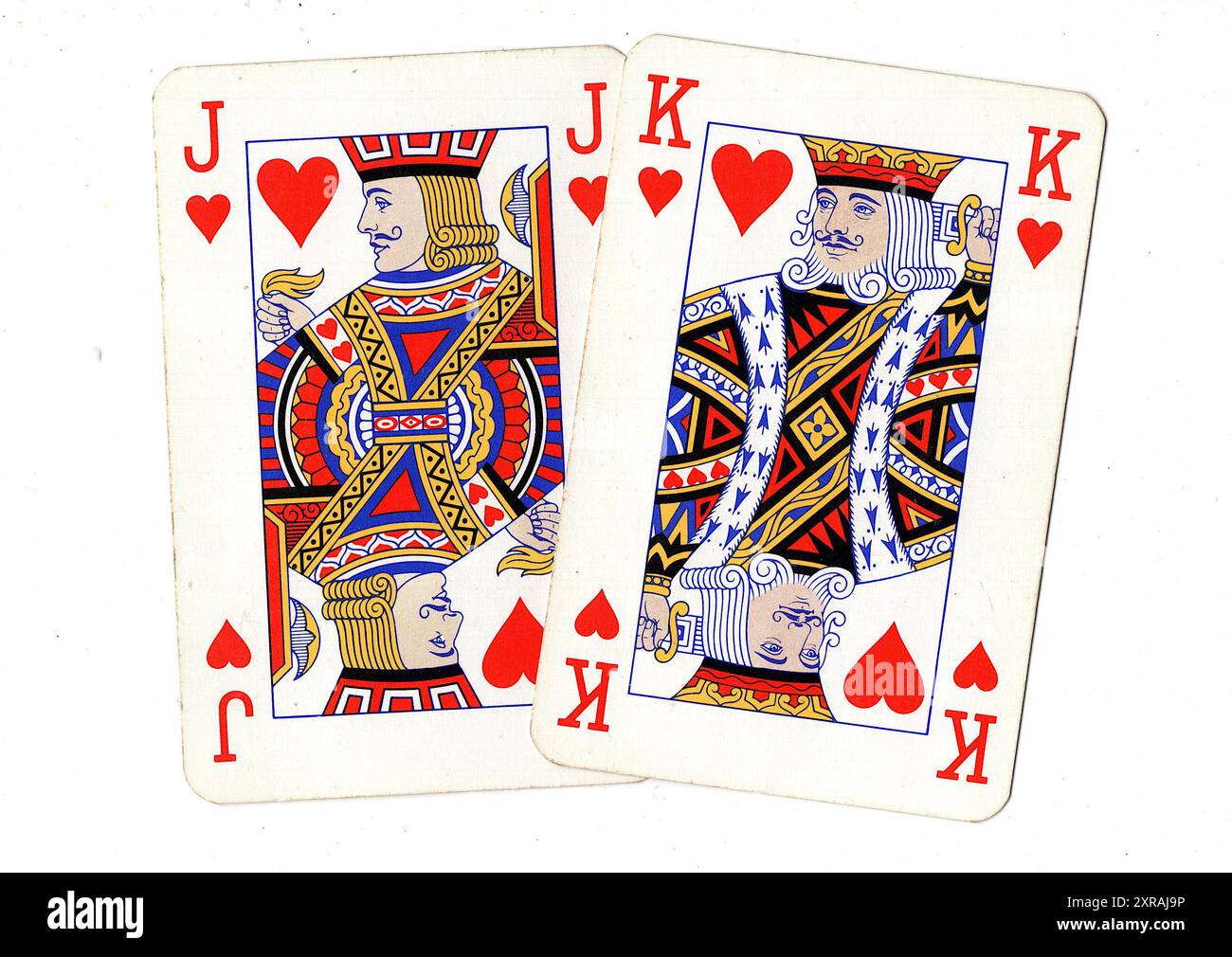 A pair of vintage pontoon playing cards in hearts on a white background ...