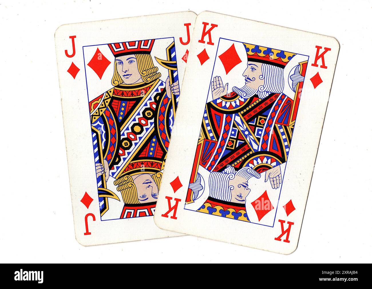 A pair of vintage pontoon playing cards in diamonds on a white ...