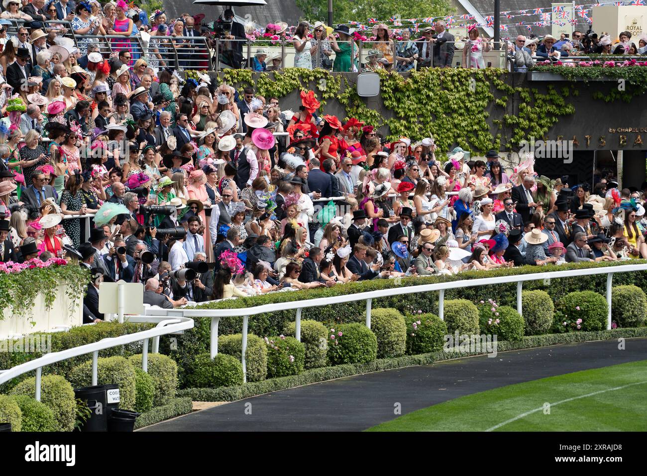 Ascot, UK. 20th June, 2024. Crowds await the arrival of the Royal ...