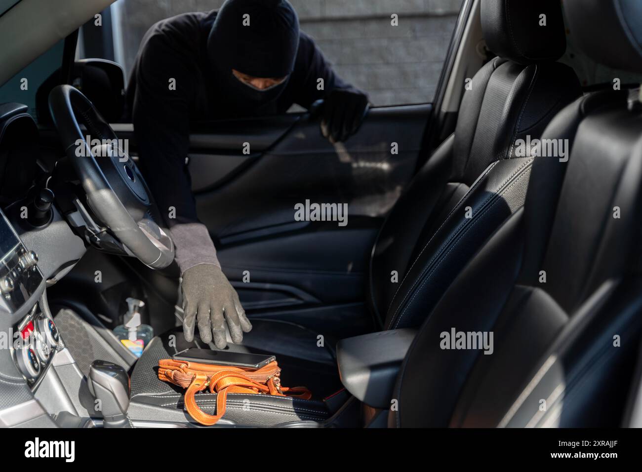 Valuable personal things left on the front seat are easy catch for the ...