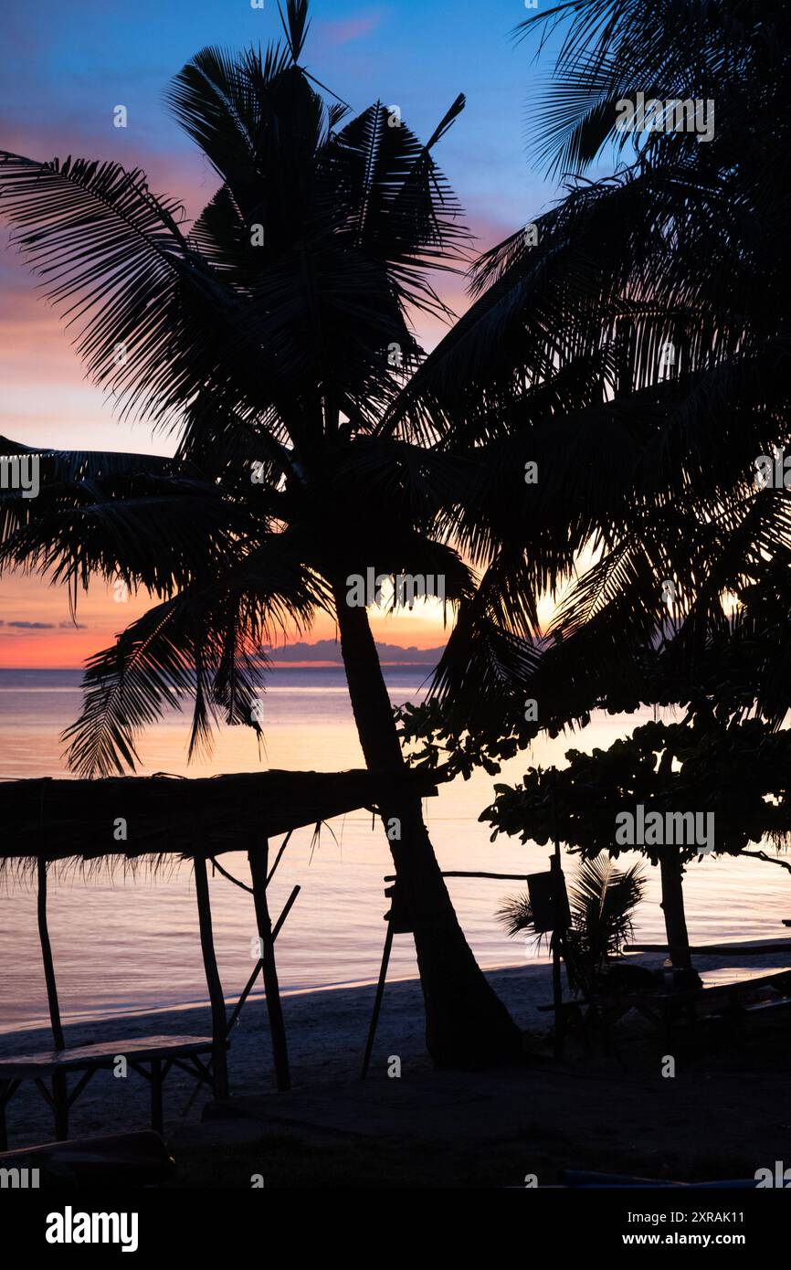 Beautiful sunset on a beach in Siquijor, Philippines Stock Photo - Alamy