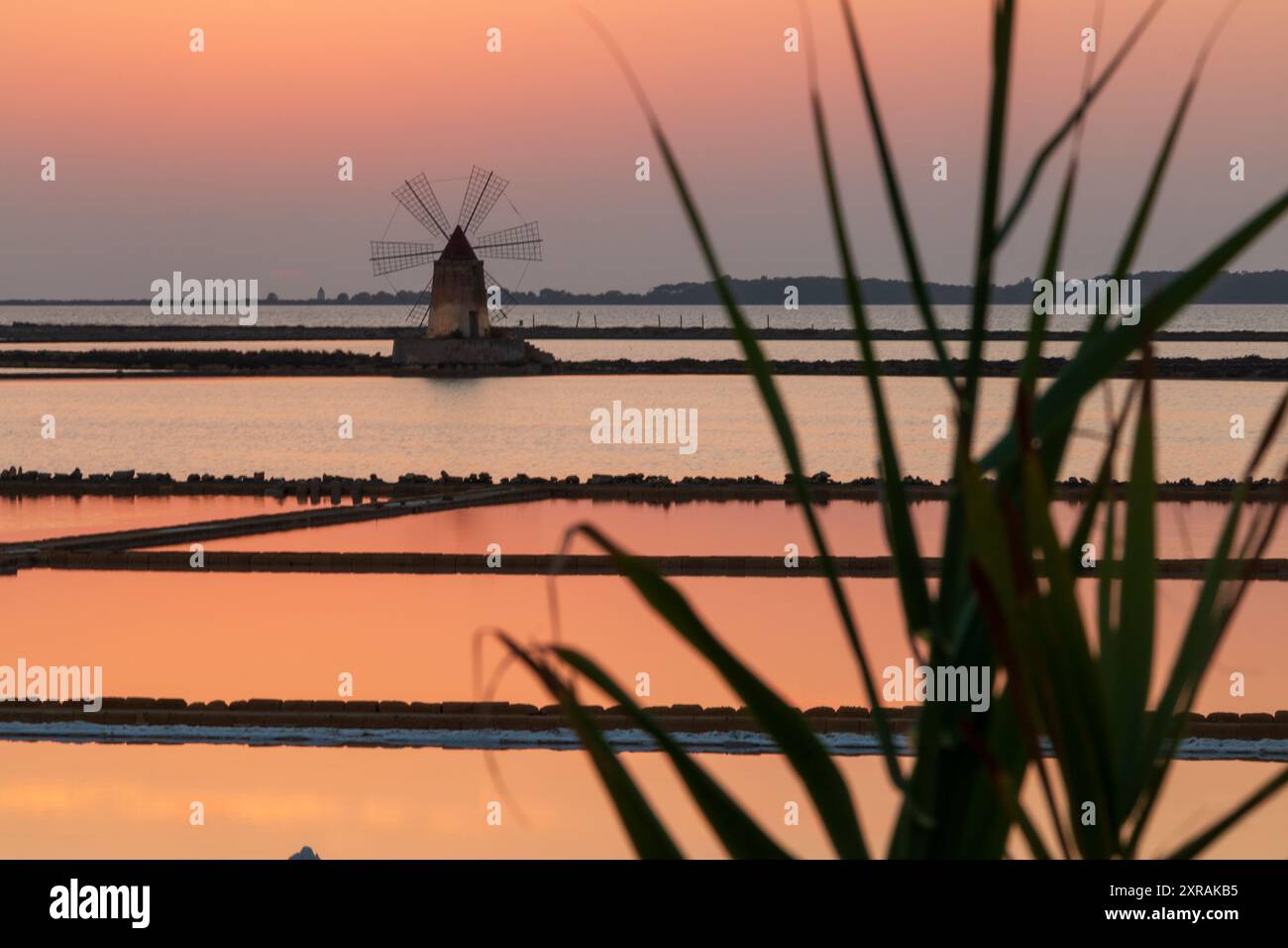 the famous windmills of the Marsala salt pans Stock Photo - Alamy