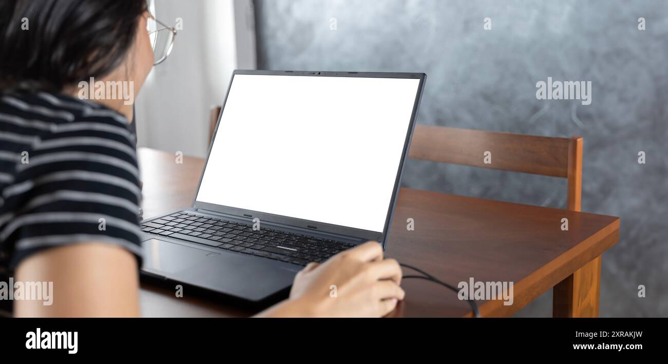 Business woman worker or student elearning looking at white mock up ...