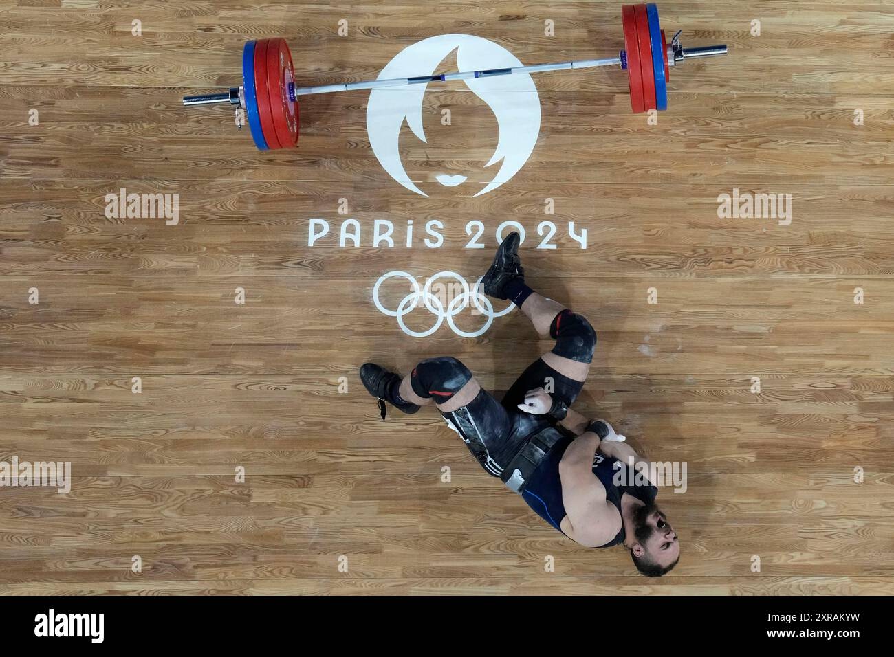Karim Abokahla of Egypt reacts after a failed lift during the men's ...