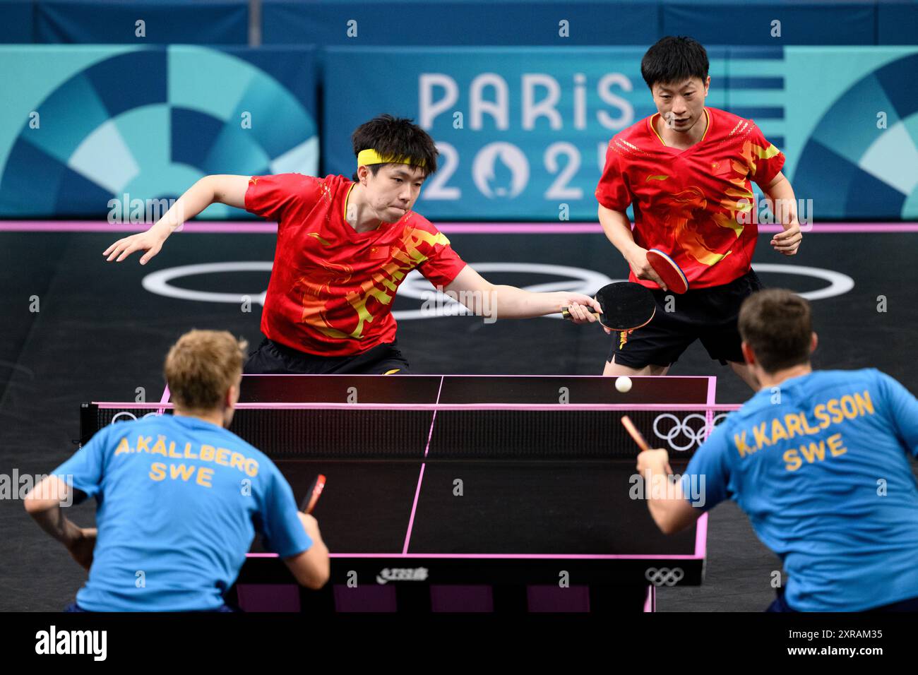 Wang Chuqin and Ma Long of, China. , . in the men's team table tennis final match between Sweden ...