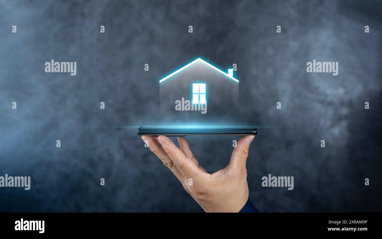 Businessman hold house icon.Smart home controlled, intelligent house ...