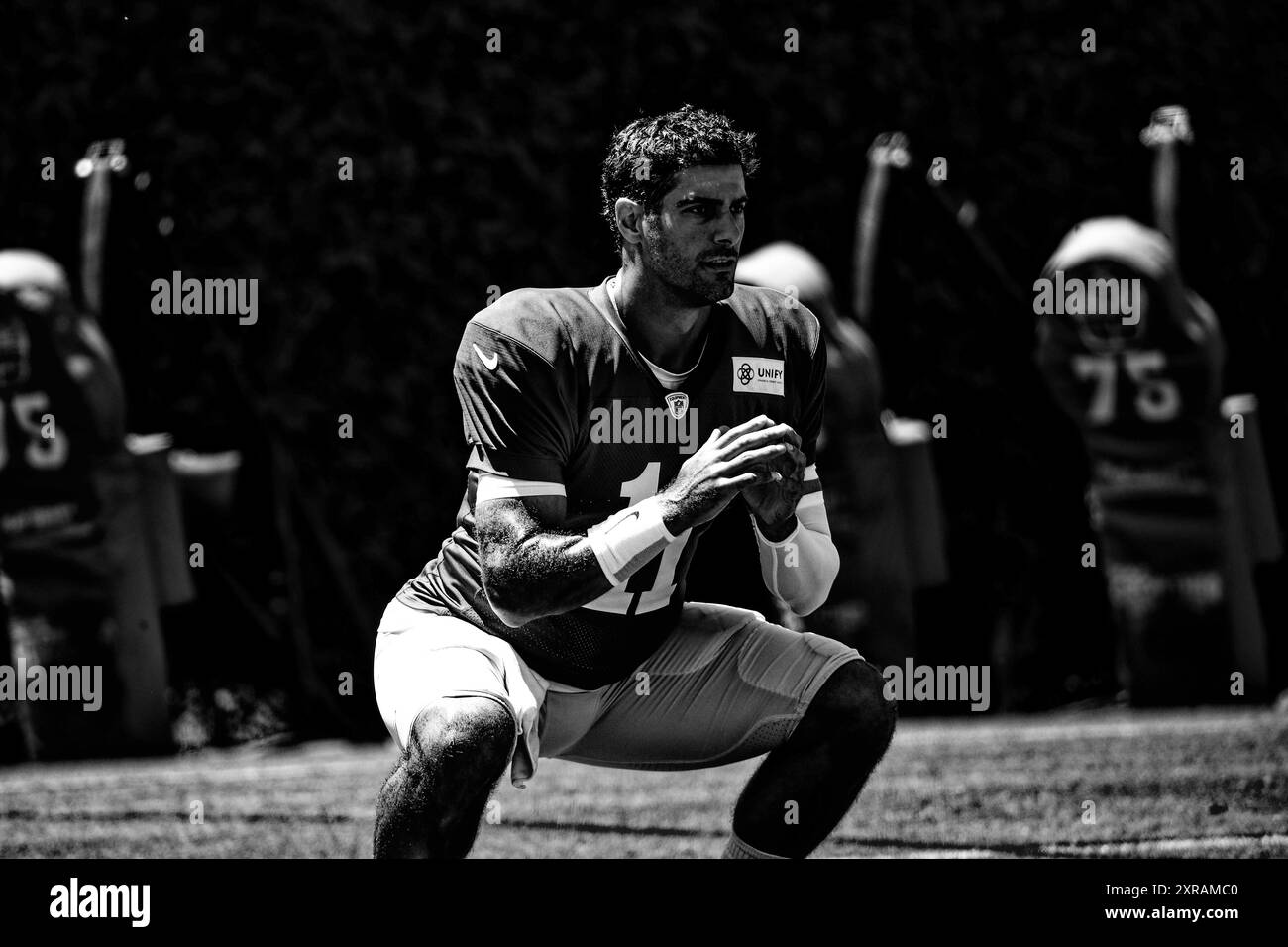 Los Angeles Rams quarterback Jimmy Garoppolo (9) stretches during ...