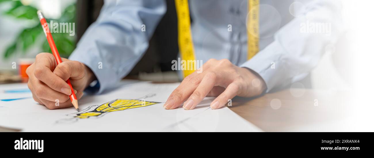 Female dressmaker or hands of fashion designer drawing sketches model ...