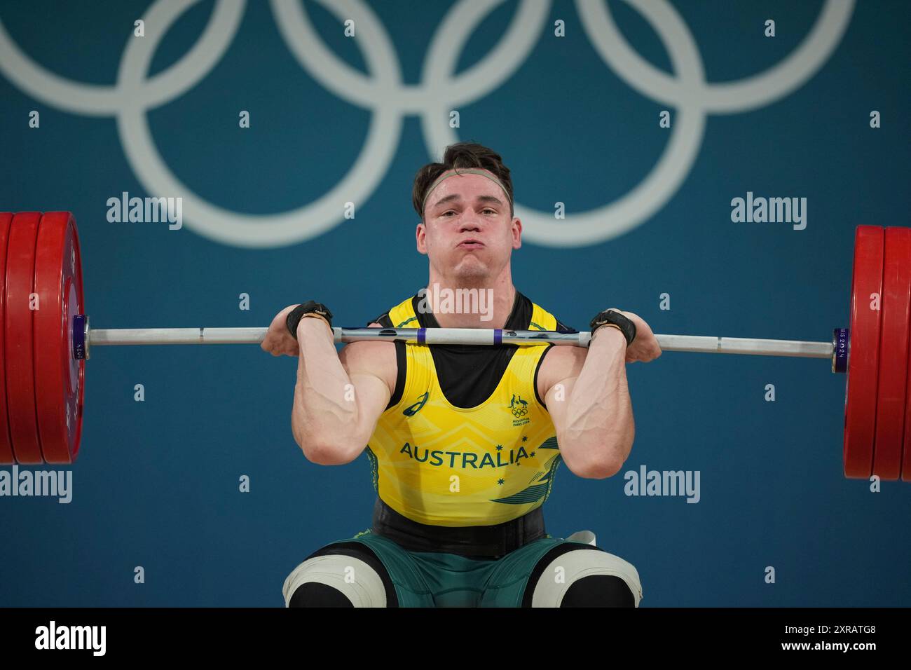 Kyle Bruce of Australia competes during the men's 89kg weightlifting ...