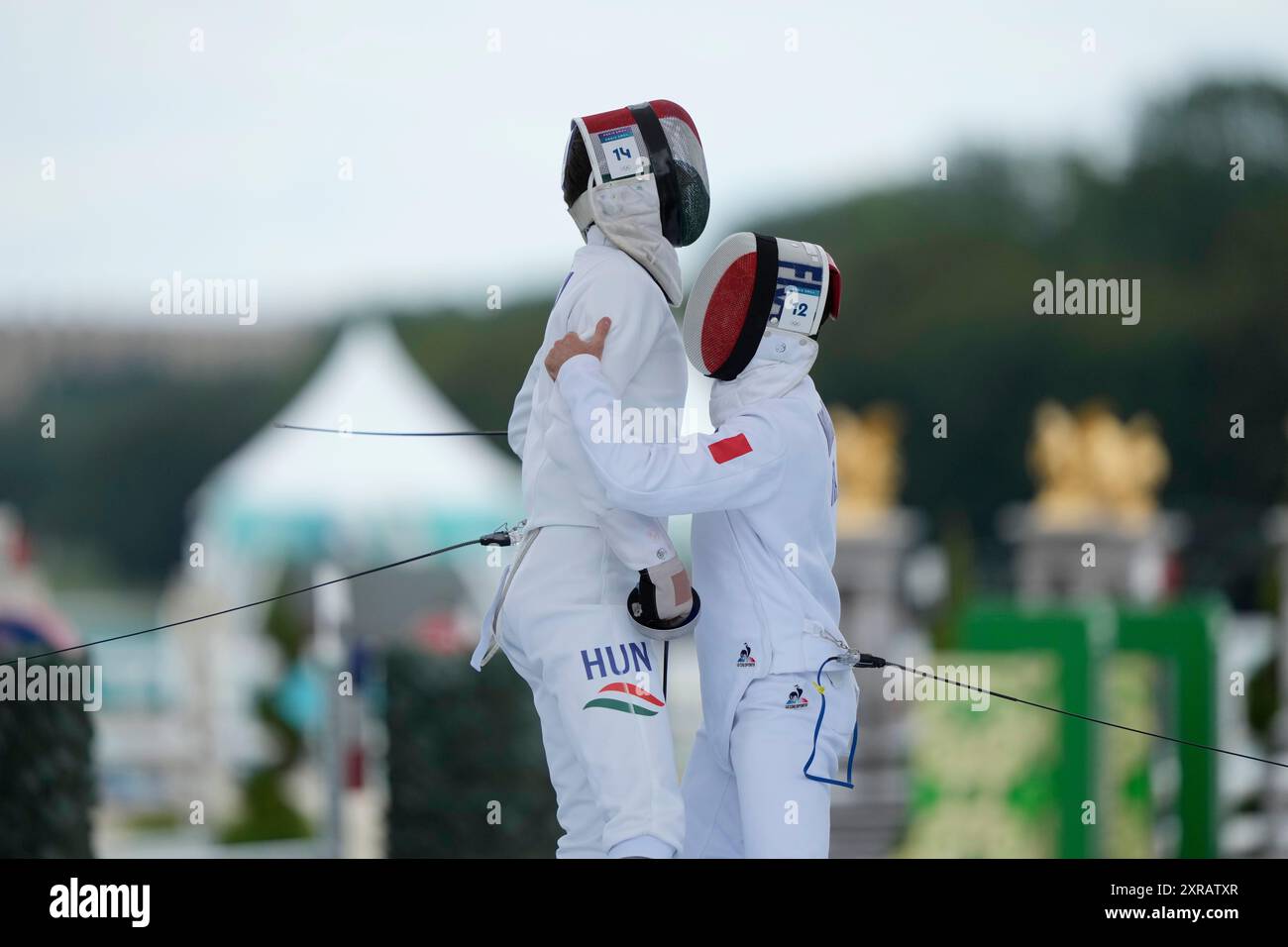 Hungary's Csaba Bohm and France's Jean-Baptiste Mourcia compete in the ...