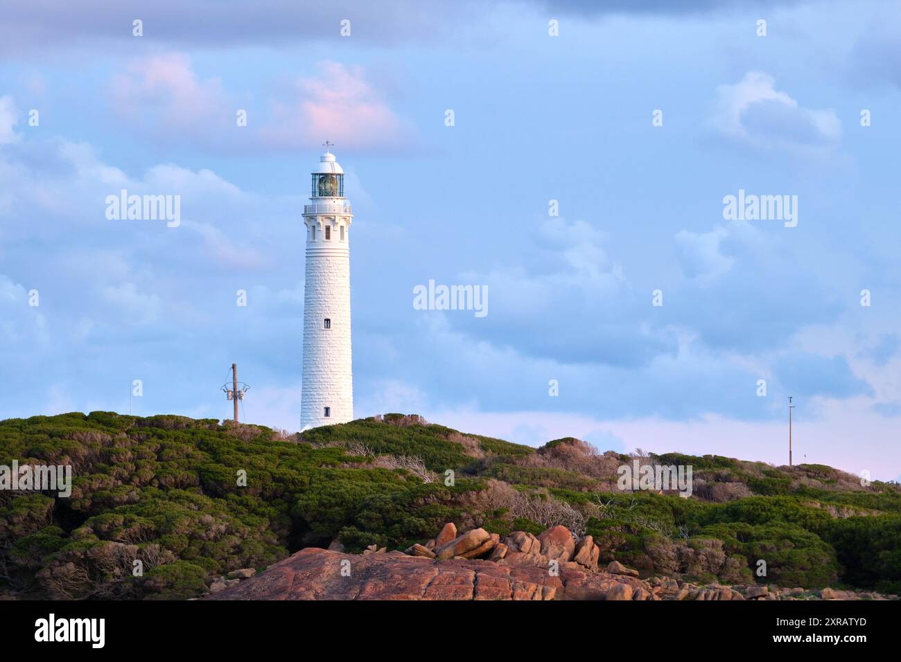 Cape Leeuwin Lighthouse in soft light at sunset with pink and blue hues ...