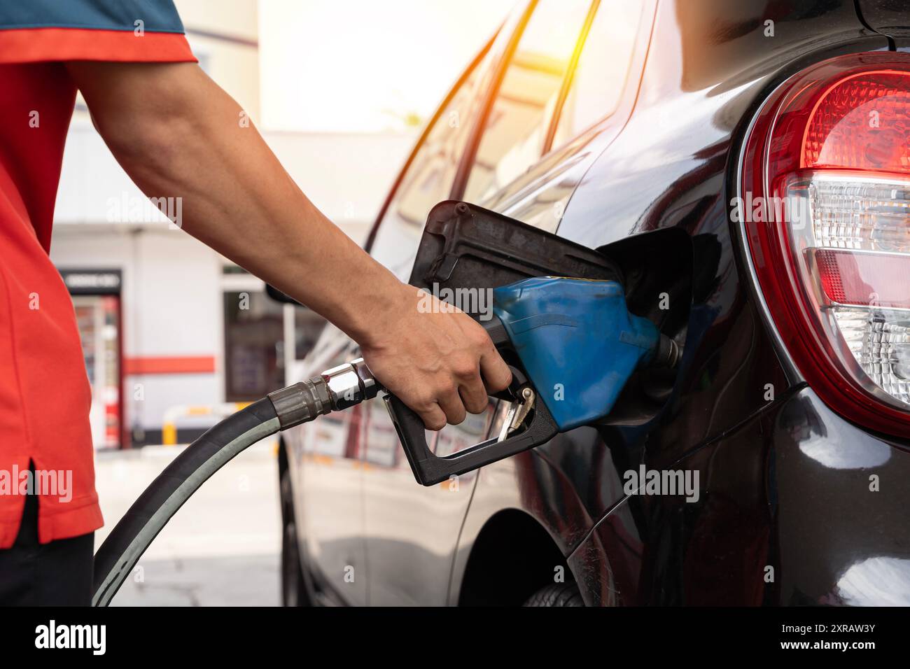 Car refueling on petrol station. Fuel pump at station. Refueling the ...
