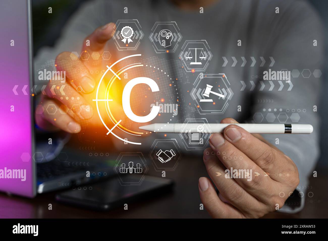 Copyright or patent concept, Person hand using laptop computer on desk ...