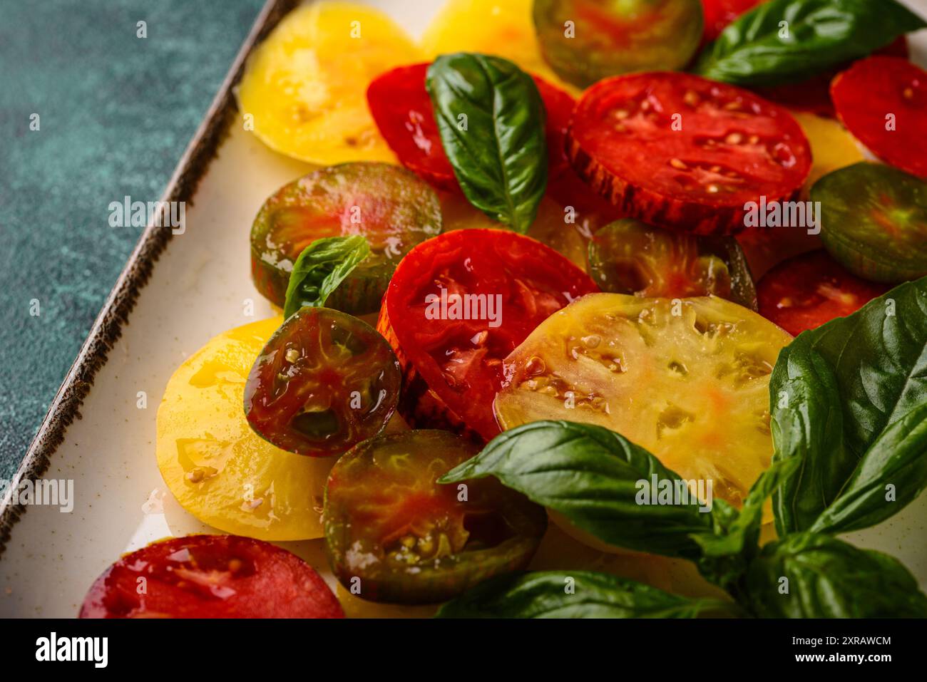 Different sort of sliced ripe tomatoes Stock Photo - Alamy