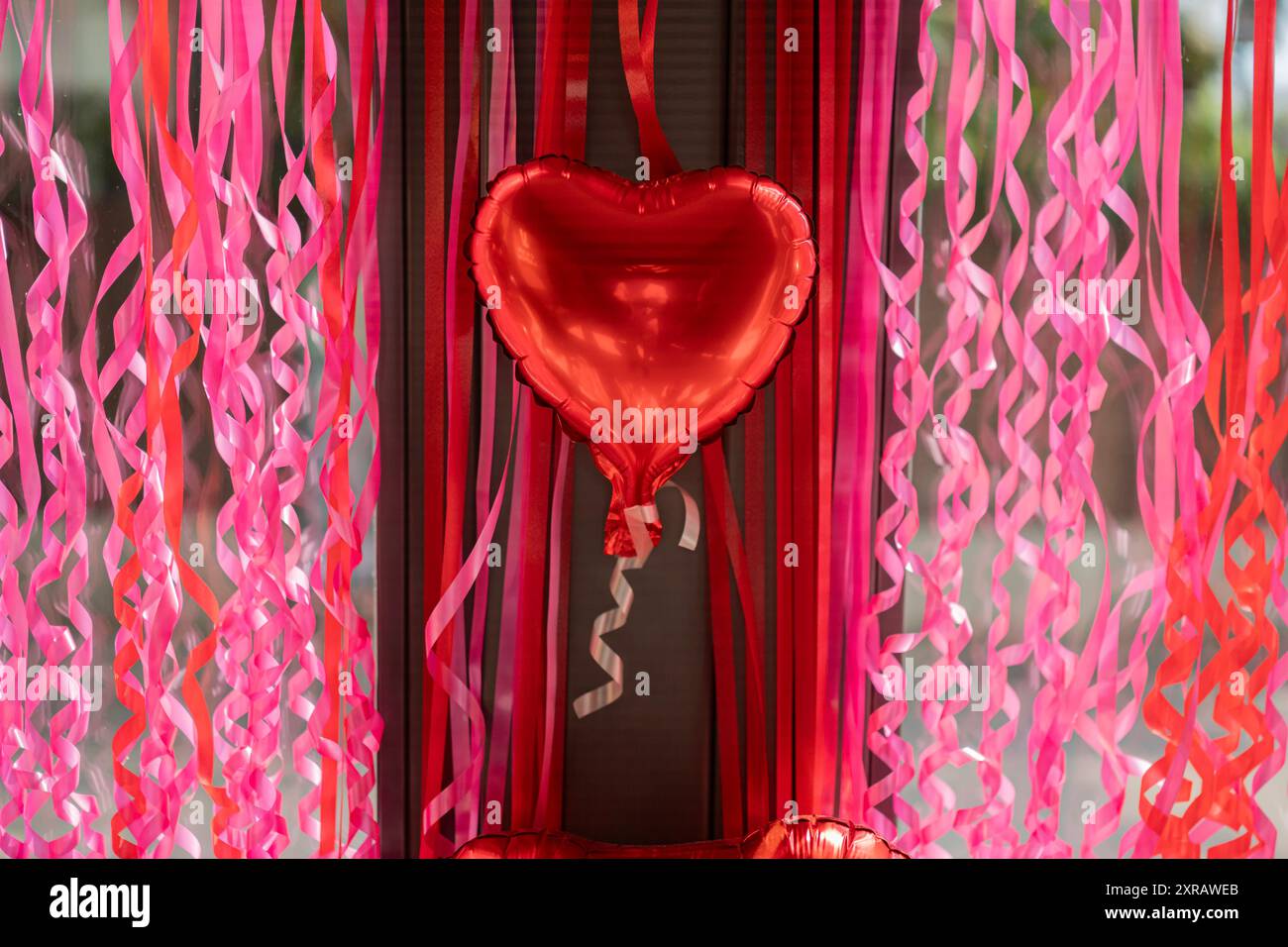 Flying pastel pink balloons hi-res stock photography and images - Alamy