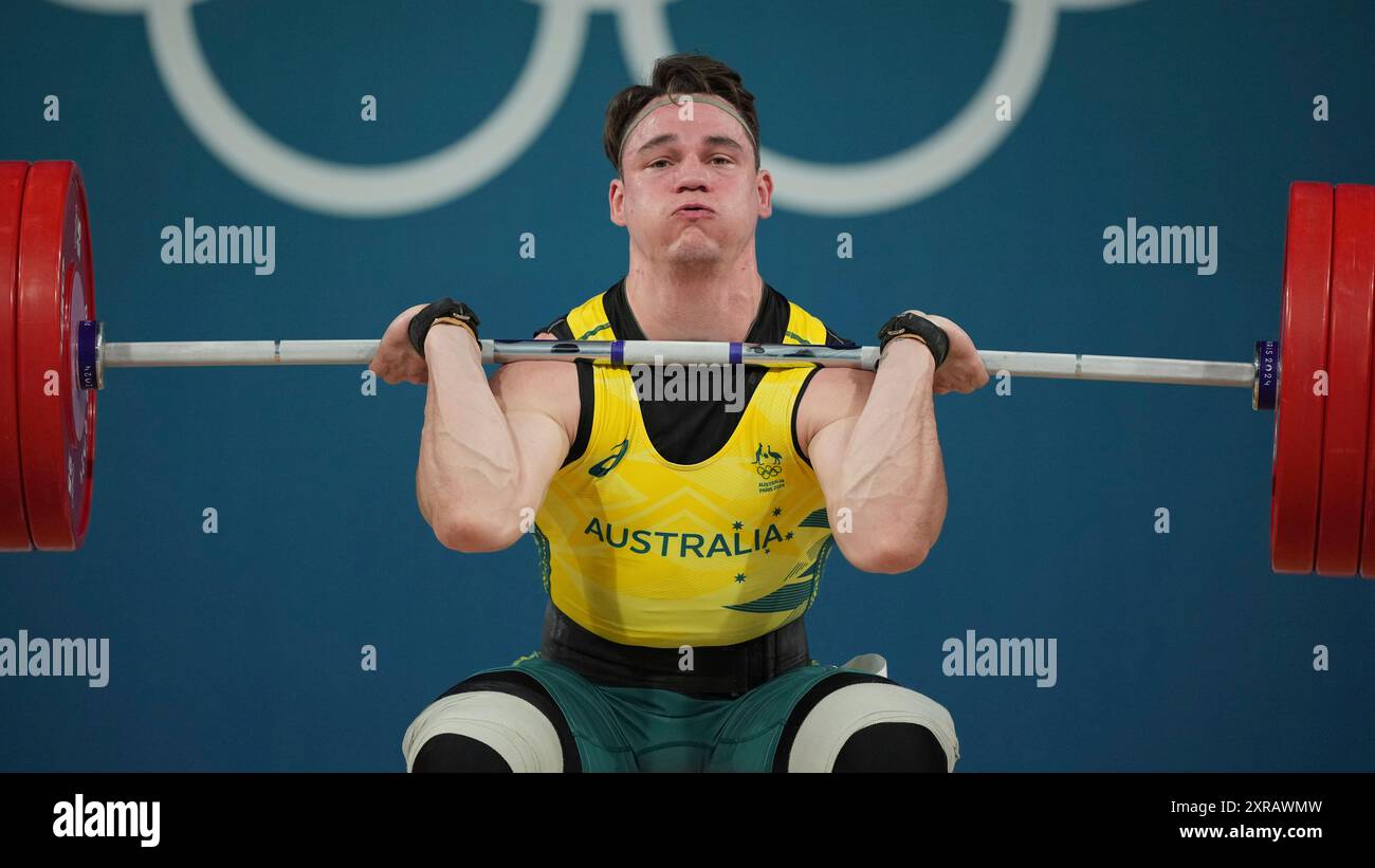 Kyle Bruce of Australia competes during the men's 89kg weightlifting ...