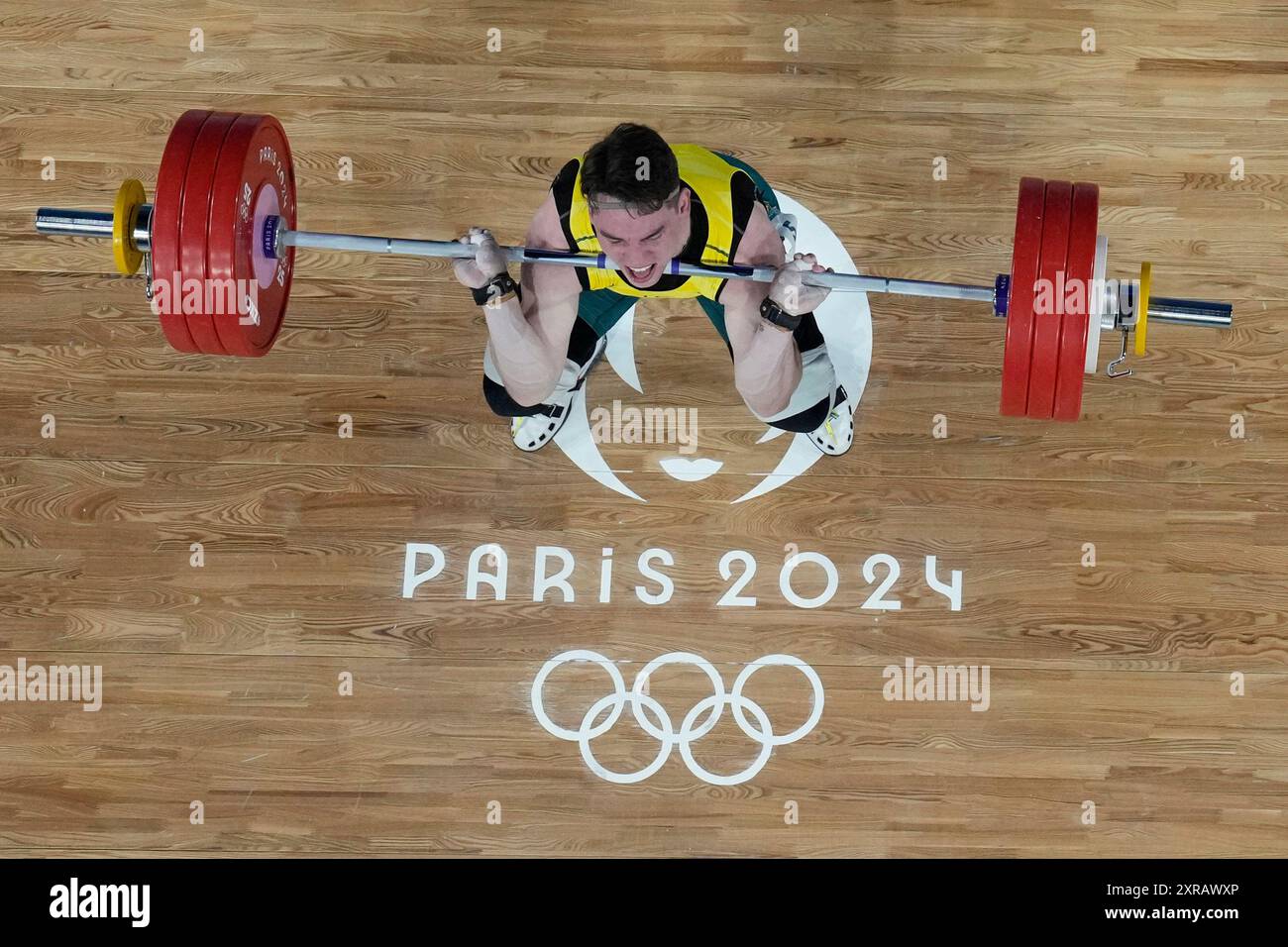 Kyle Bruce of Australia competes during the men's 89kg weightlifting ...