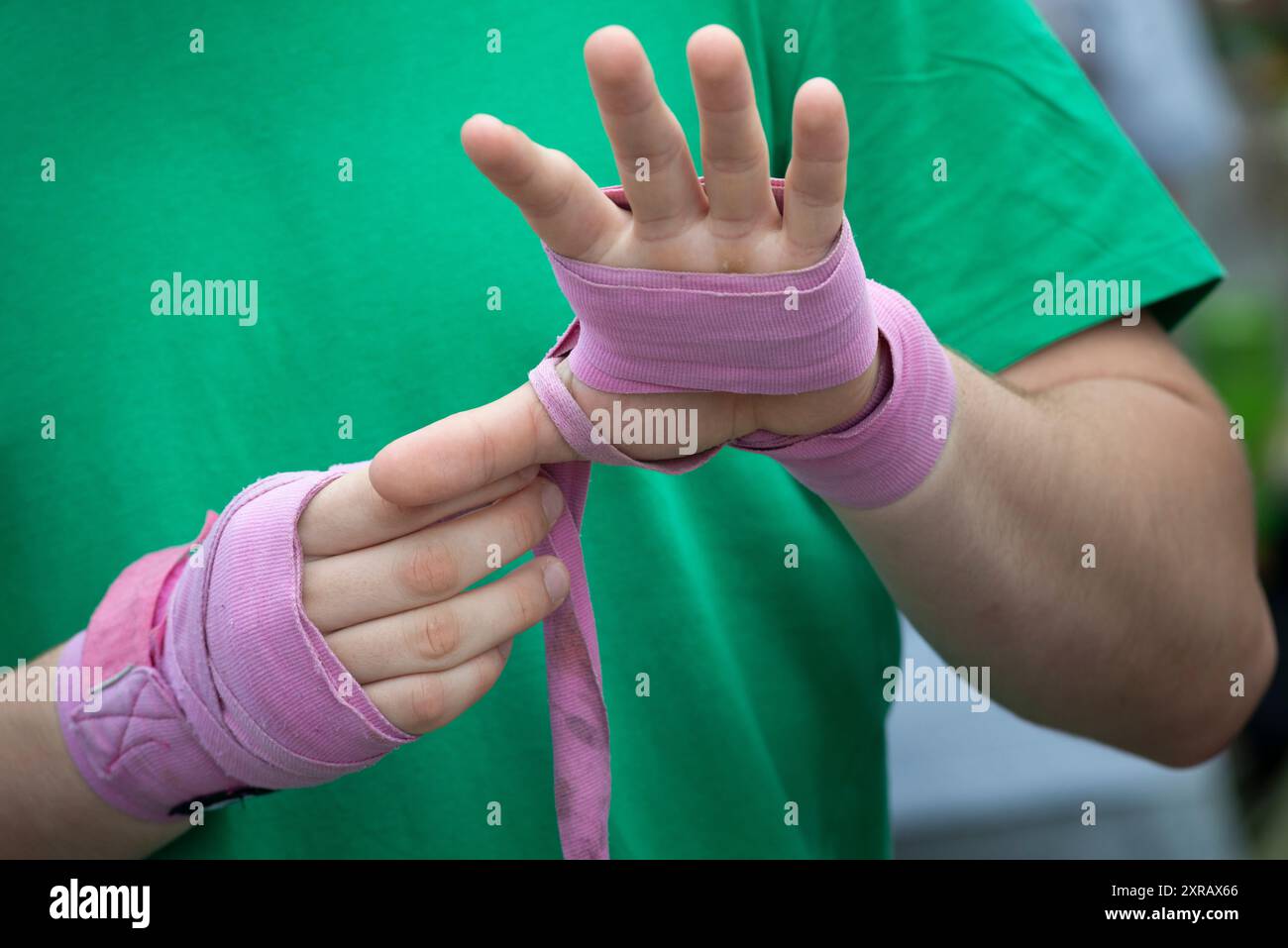 Boxer wrapping Her Hands Stock Photo - Alamy