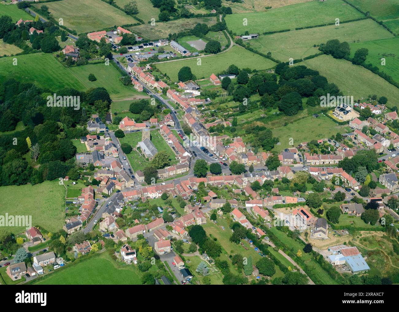 An aerial drone shot of the north yorkshire village of hi-res stock ...
