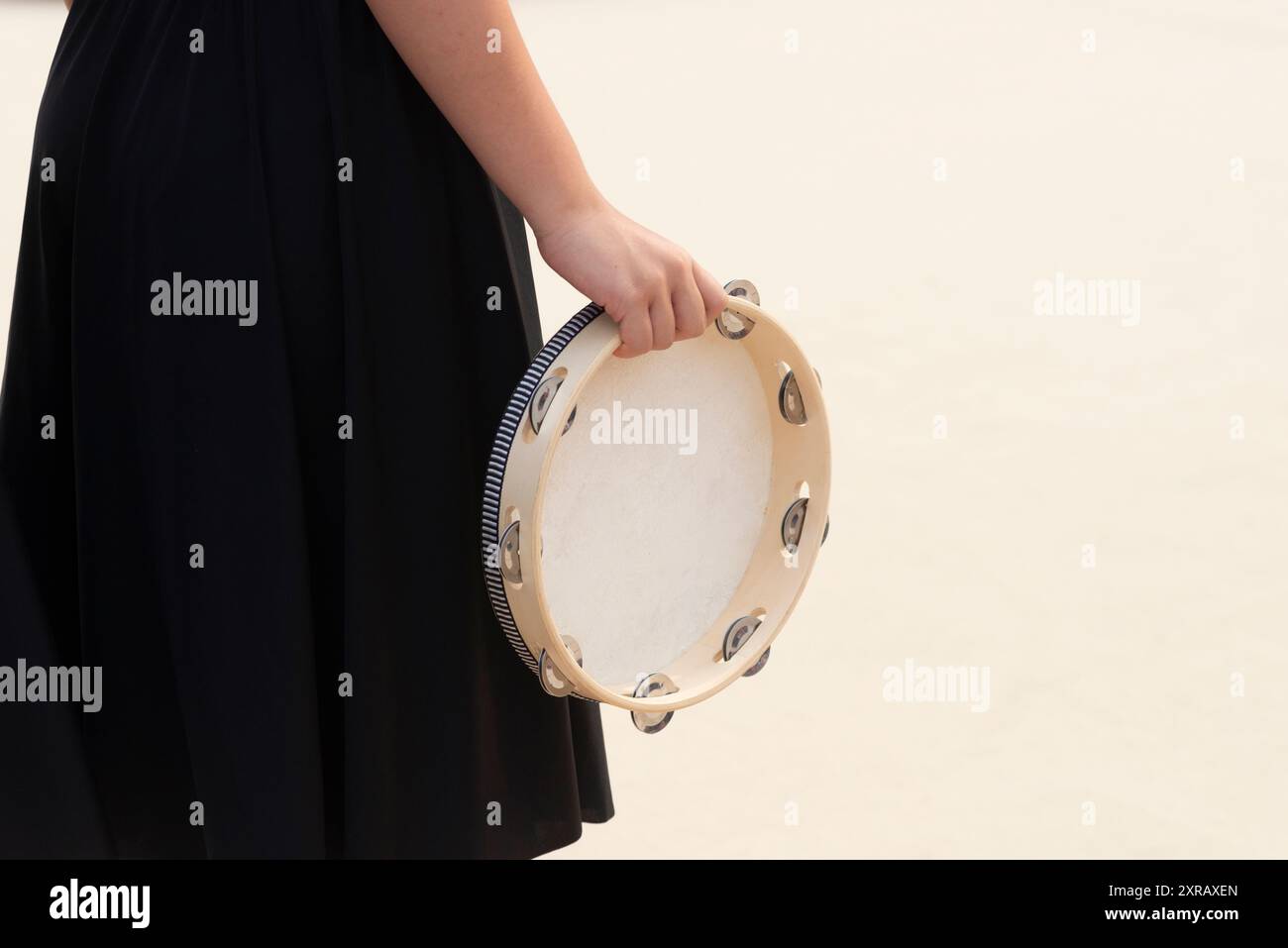 Woman Dancer Play with Tambourine Stock Photo - Alamy