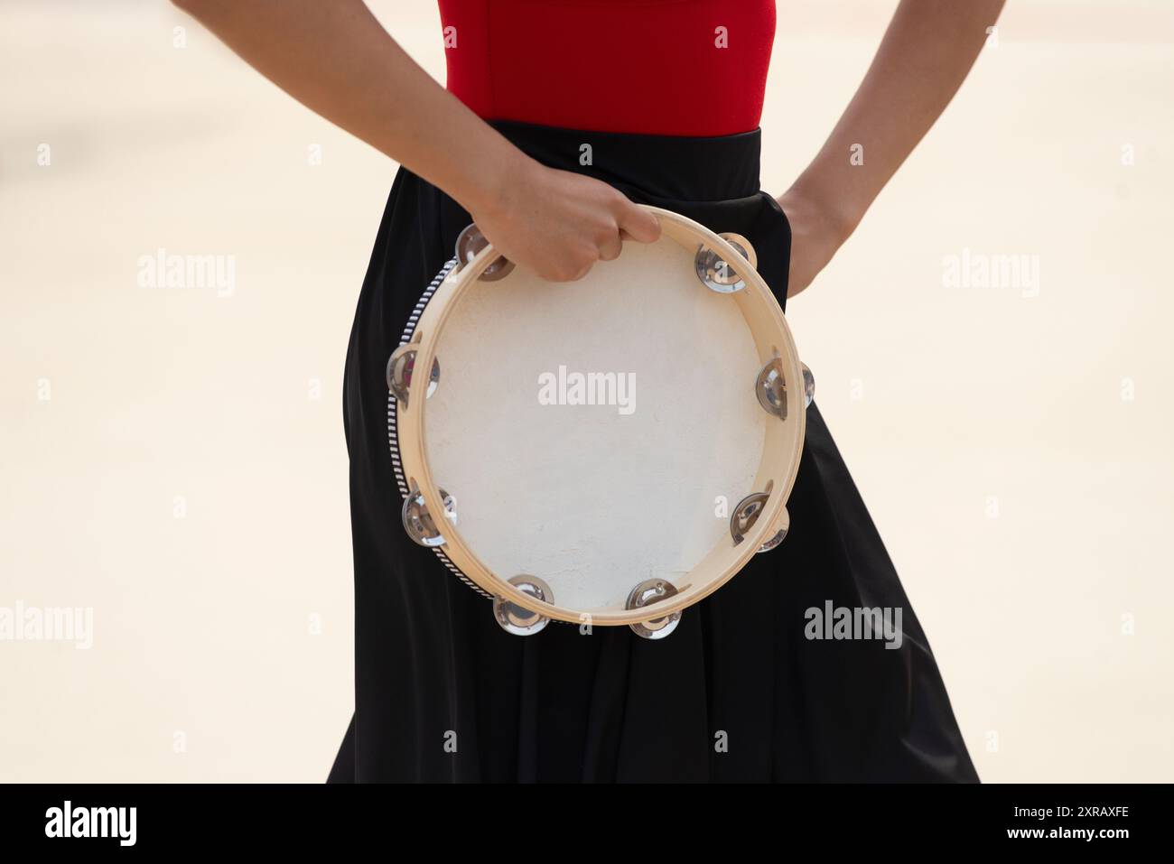Woman Dancer Play with Tambourine Stock Photo - Alamy