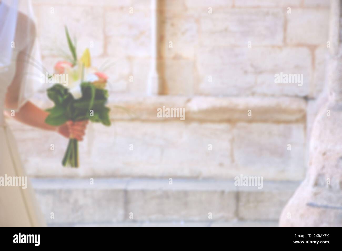 Blurry photo of bride entering to the church in her wedding day Stock ...