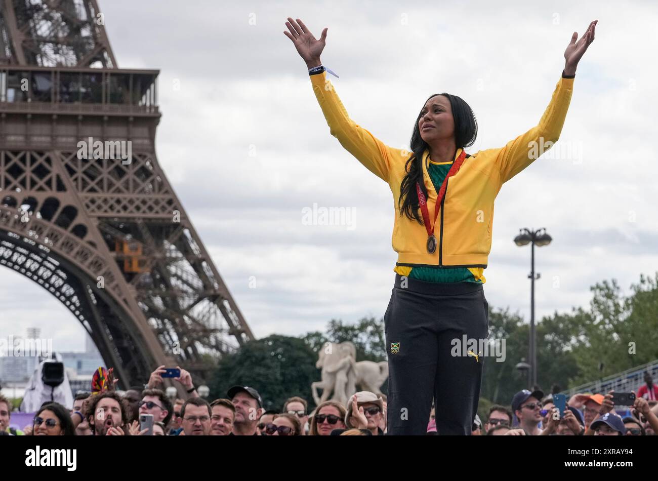 Chelsea Hammond-Ross of Jamaica waves to the crowd after receiving her ...