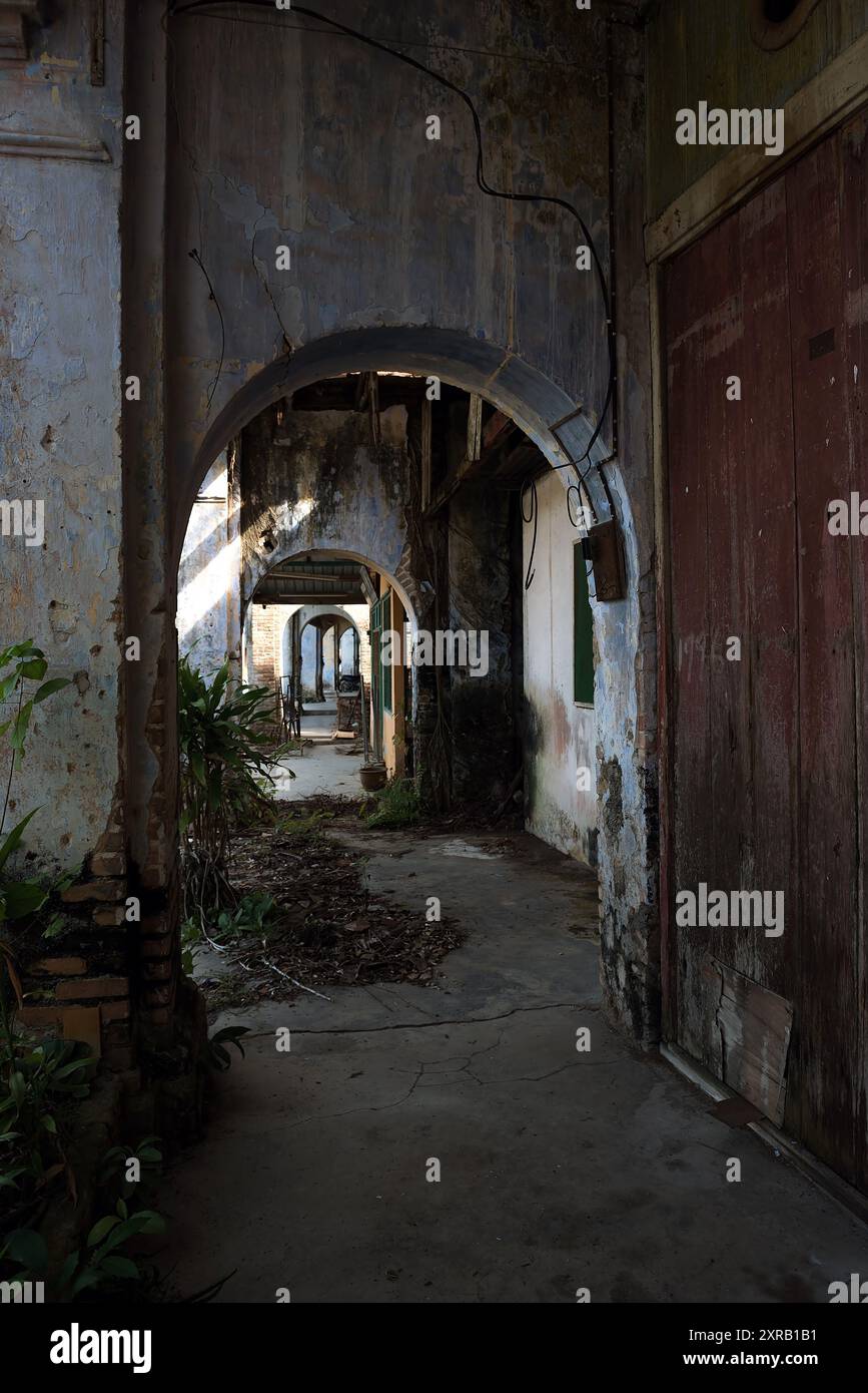 Dilapidated vintage corridor in the abandoned tin mining town of Jalan ...