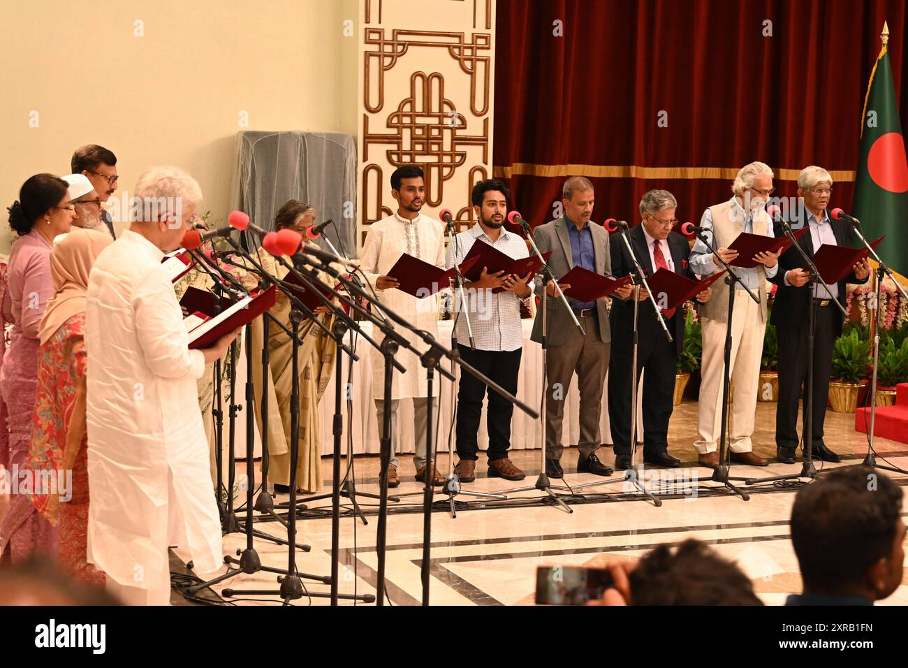 Members of the newly formed interim government are taking the oath at ...