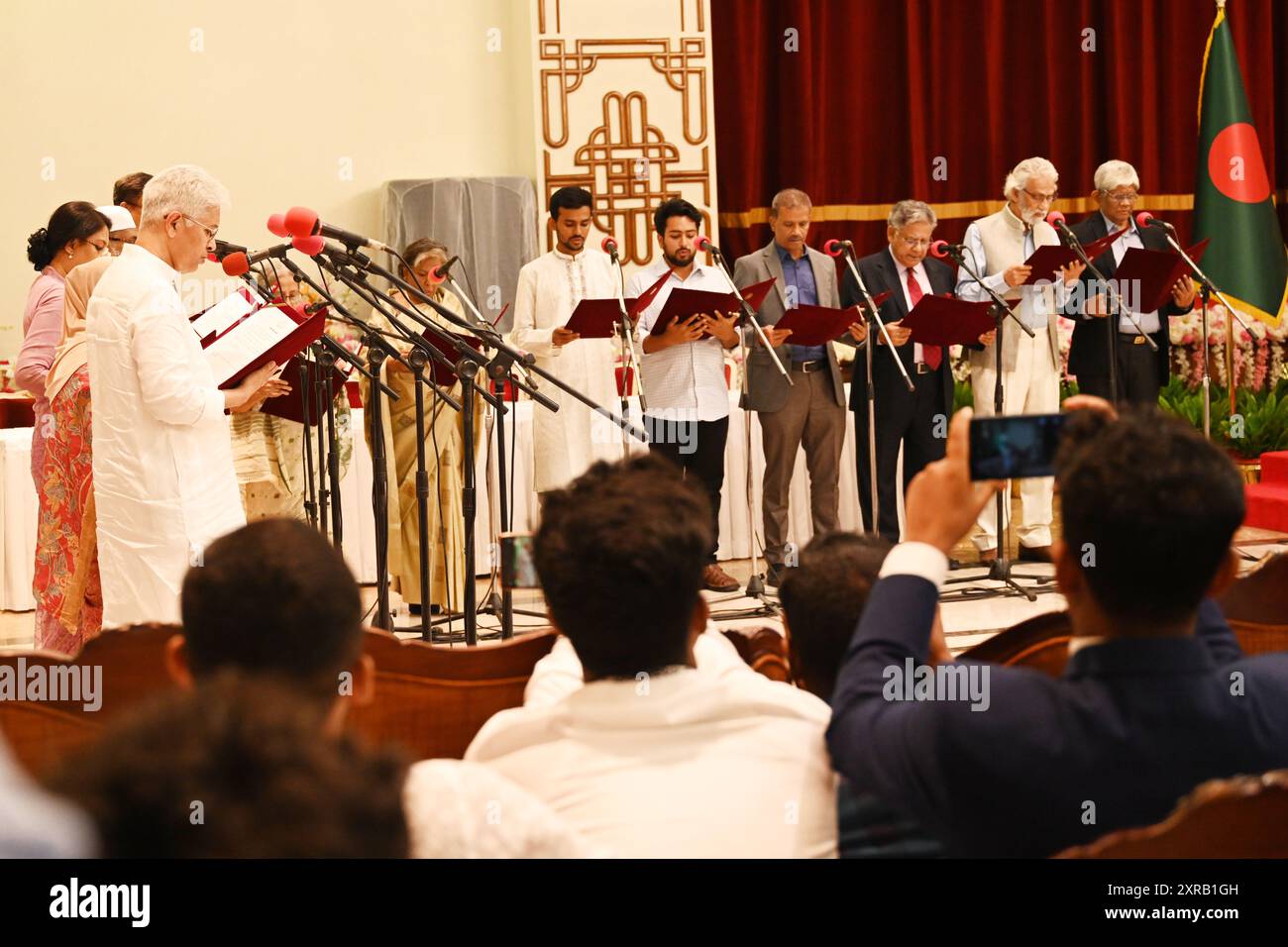 Members of the newly formed interim government are taking the oath at ...