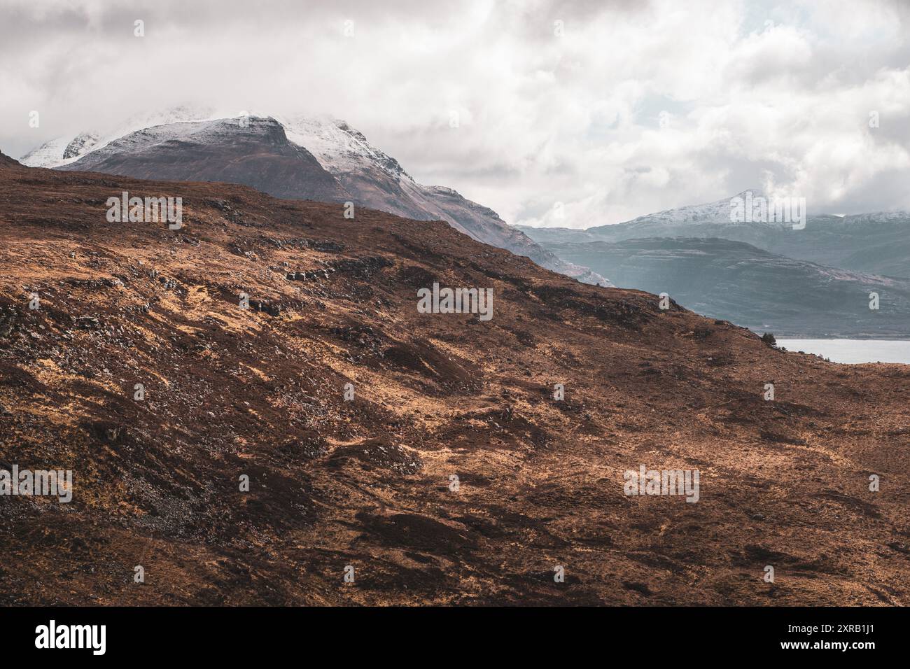 A scenic Scottish Highlands disappearing into misty mountains, with ...