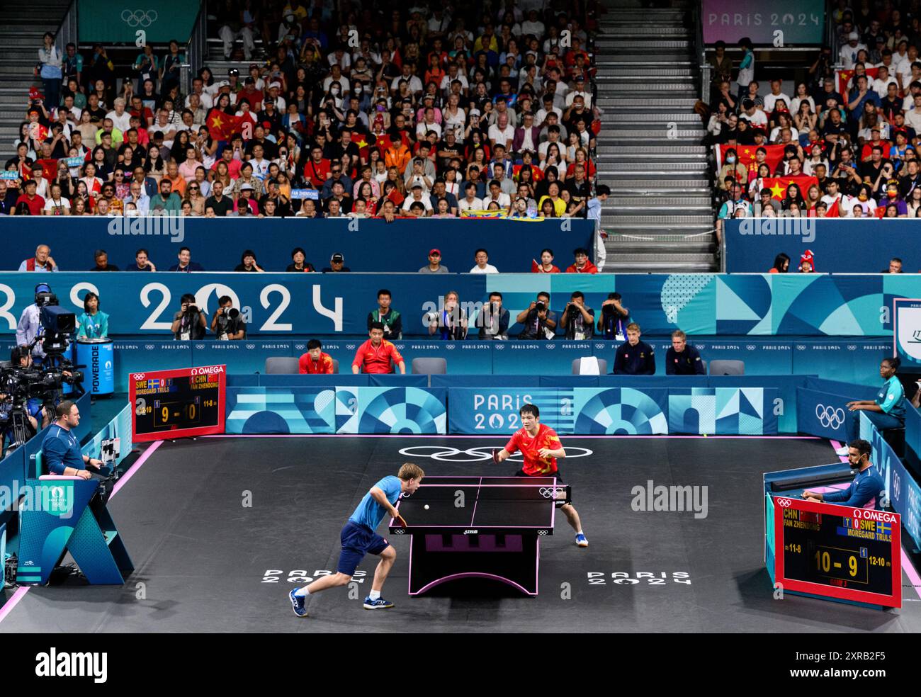 Truls Möregårdh of, Sweden. , . and Fan Zhendong of China in the men's ...