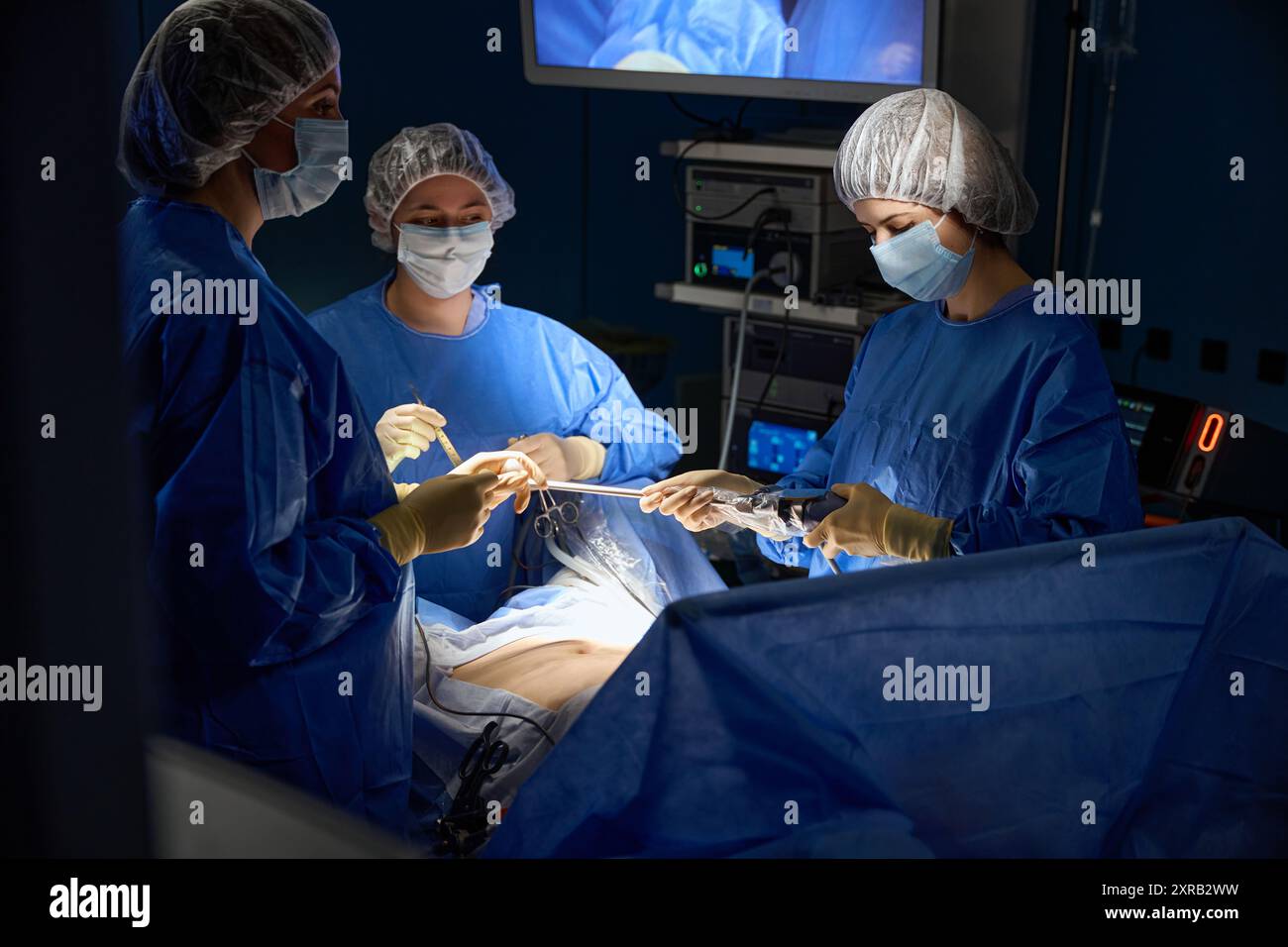 Teamwork of the operating team at the surgical table Stock Photo - Alamy