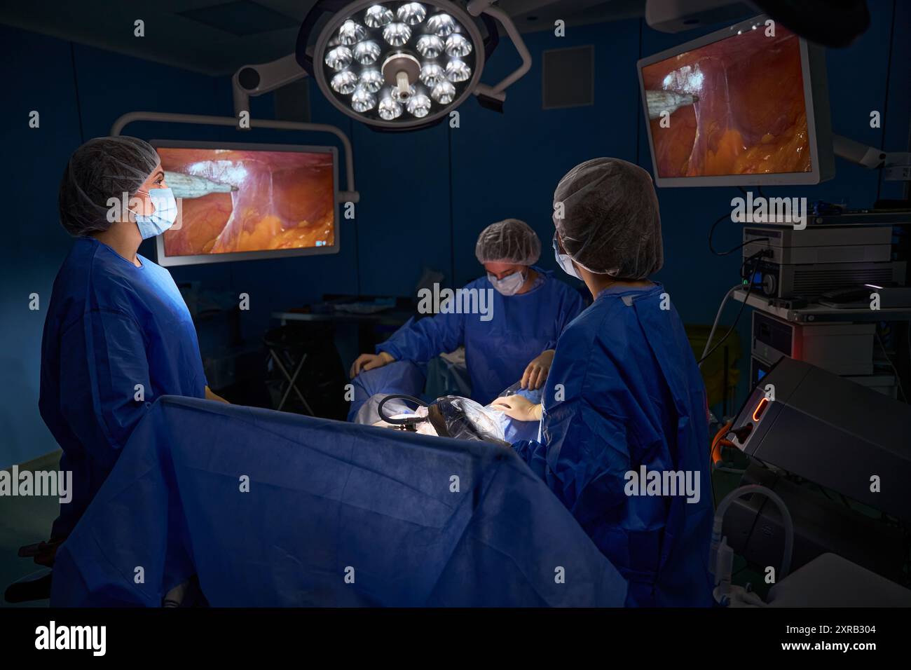 Group of doctor in operation room for laparoscopic surgical Stock Photo ...