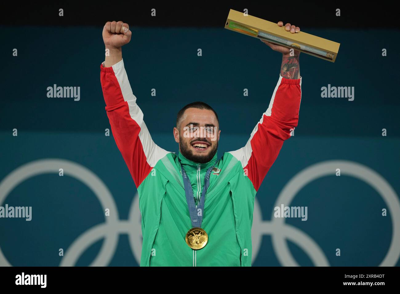 Gold medalist Karlos May Nasar of Bulgaria celebrates on the podium ...