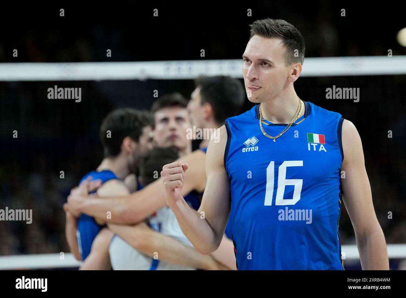 Yuri Romano of Italy, celebrates after scoring a point during the men's ...