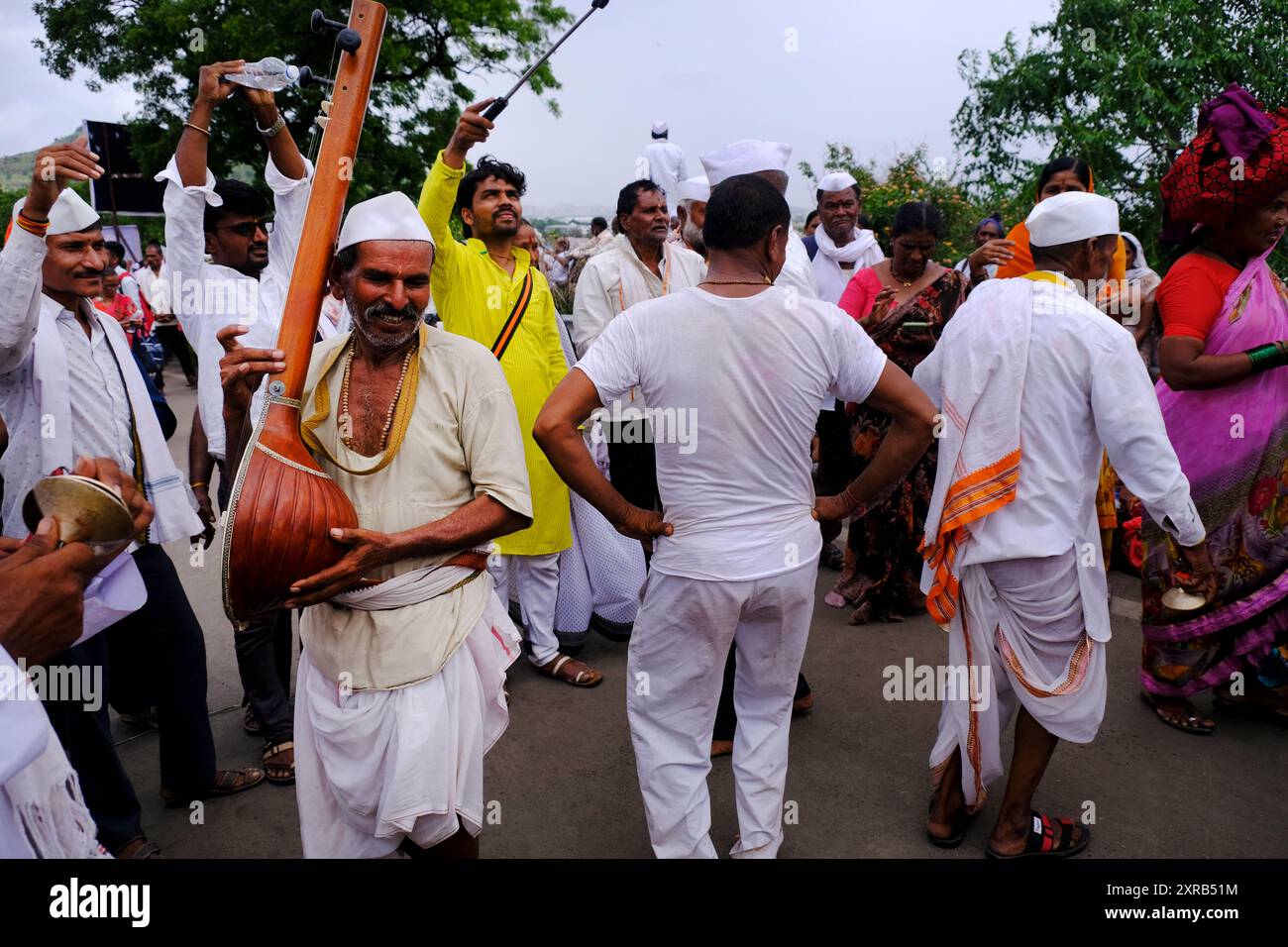 Pune, Maharashtra, India, 2 July 2024, Pilgrims or warkari with saffron ...