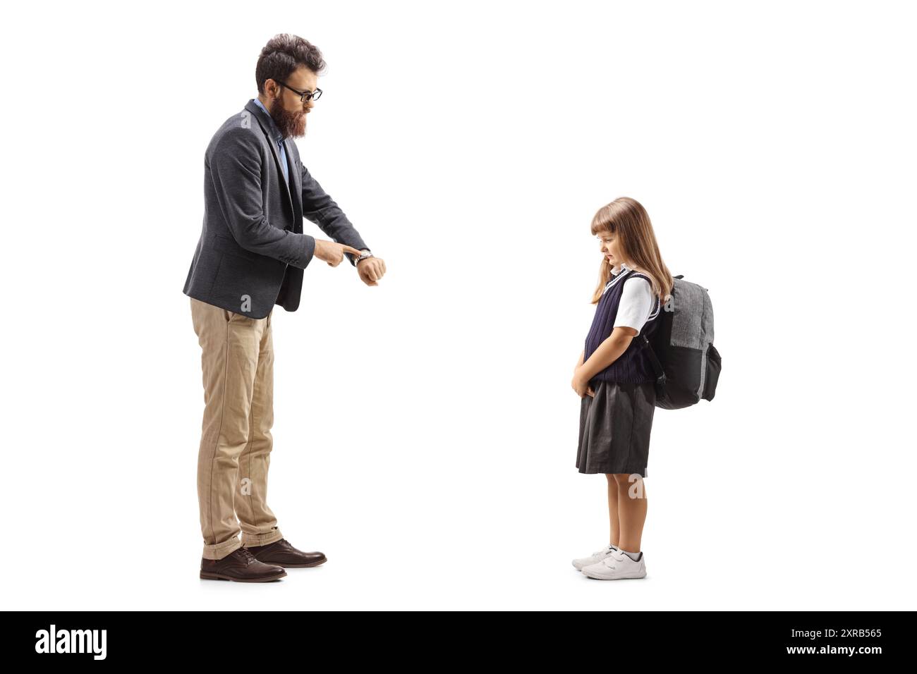Full length profile shot of a man reprimanding a schoolgirl and ...