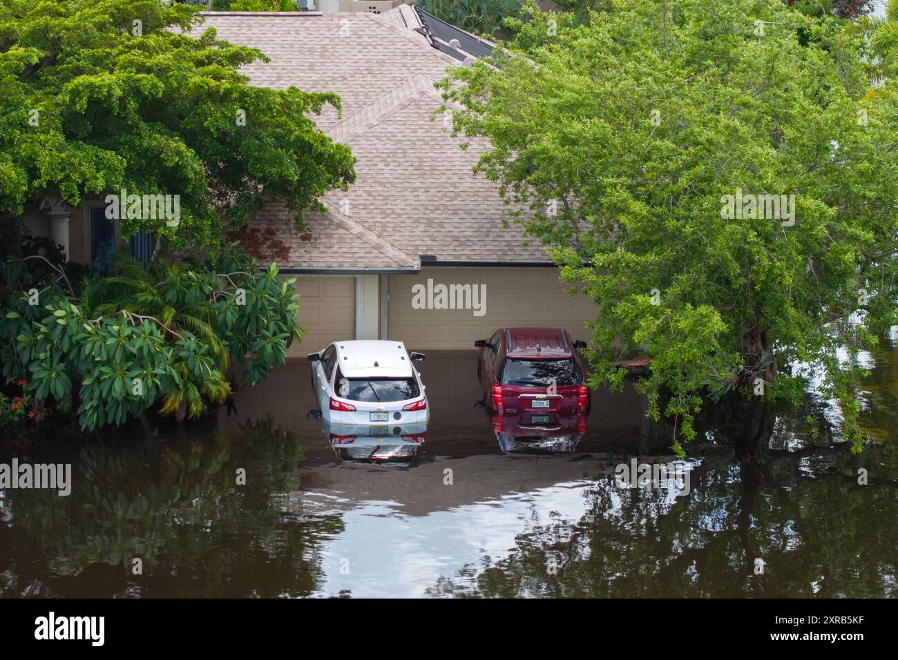 Flooding in Florida by tropical storm from hurricane Debby. Suburb ...