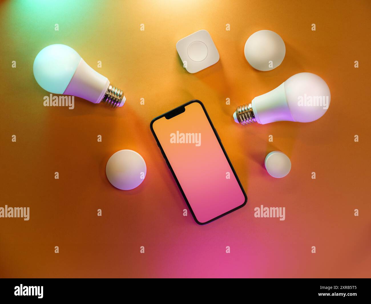 Smart home devices. Smartphone empty screen. Remote control Stock Photo ...