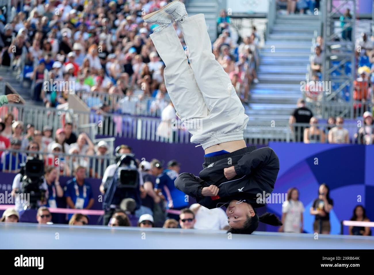 China's Qingyi Liu, known as B-Girl 671, competes during the Round ...