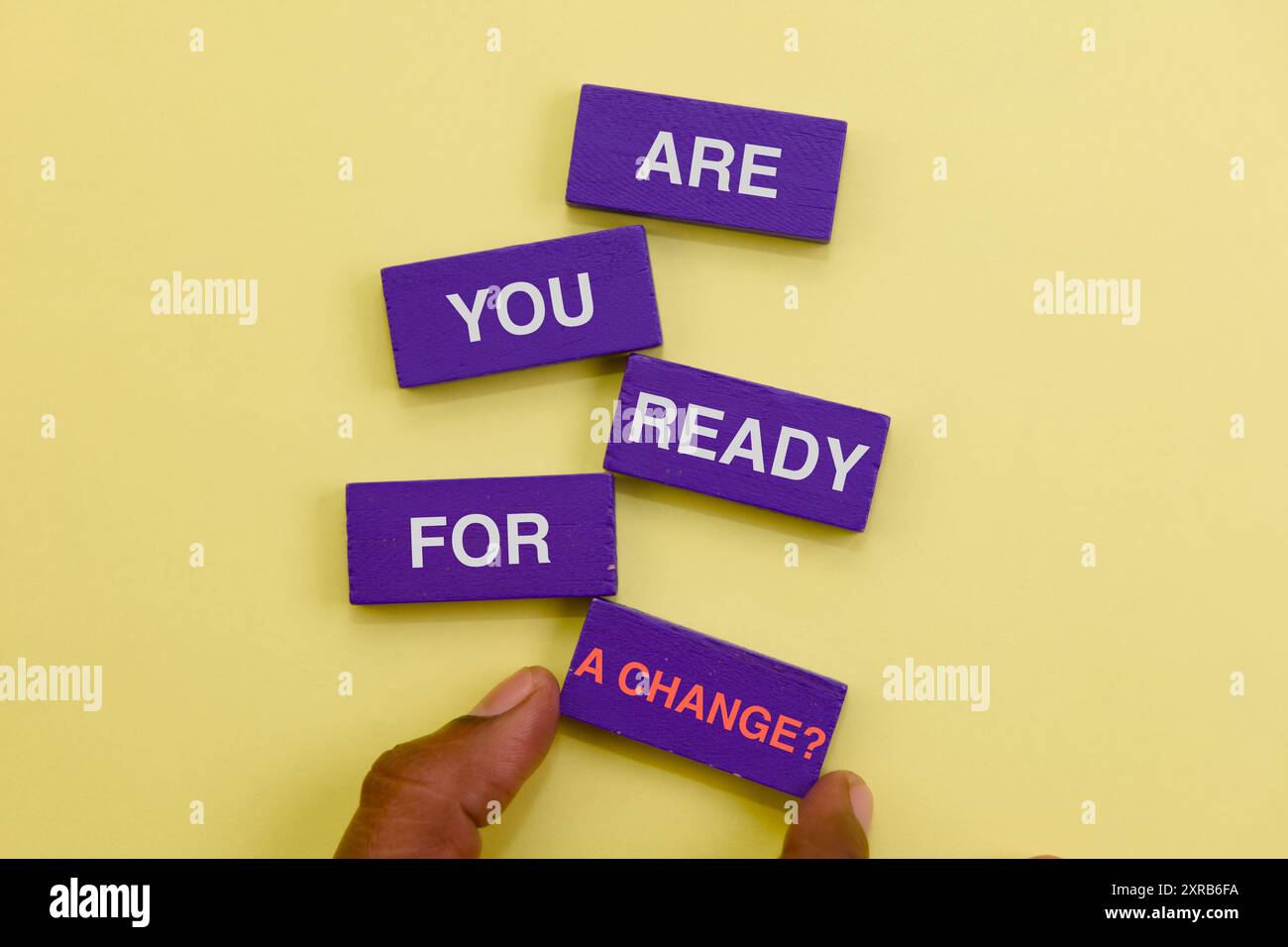 Colorful blocks spell out a motivational question, inspiring action and ...
