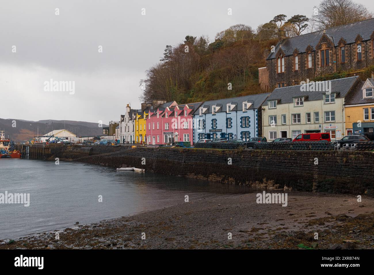 A picturesque view of colorful houses along the waterfront in Portree ...