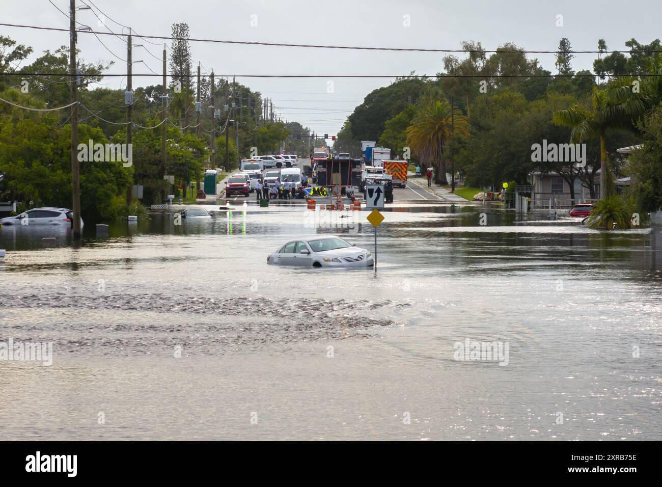 Flooded Florida street with stuck car after hurricane Debby rainfall ...