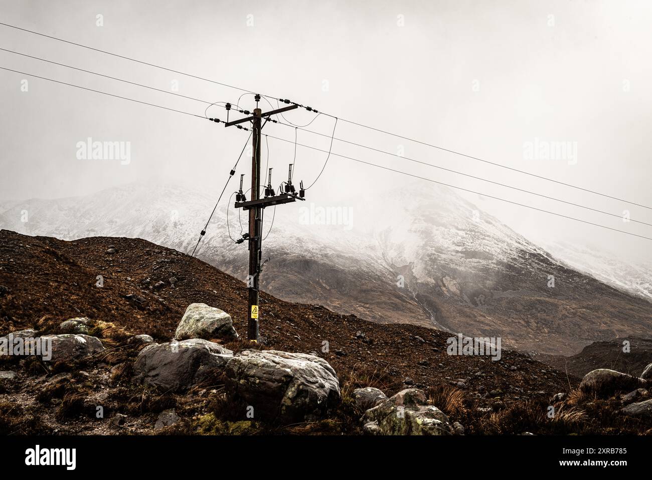 A scenic Scottish Highlands disappearing into misty mountains, with ...